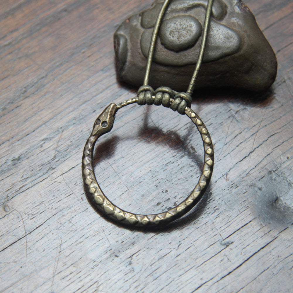 Ouroboros Snake Pendant, an infinity symbol hand forged out of pure ir ...