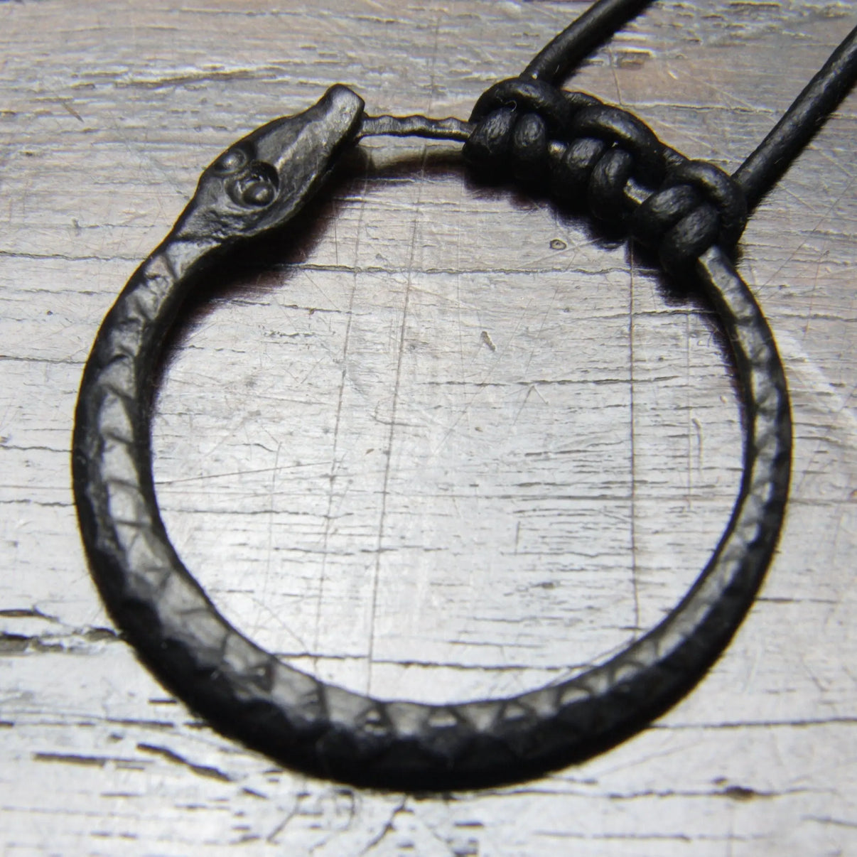 Ouroboros Snake Pendant, an infinity symbol hand forged out of pure ir ...