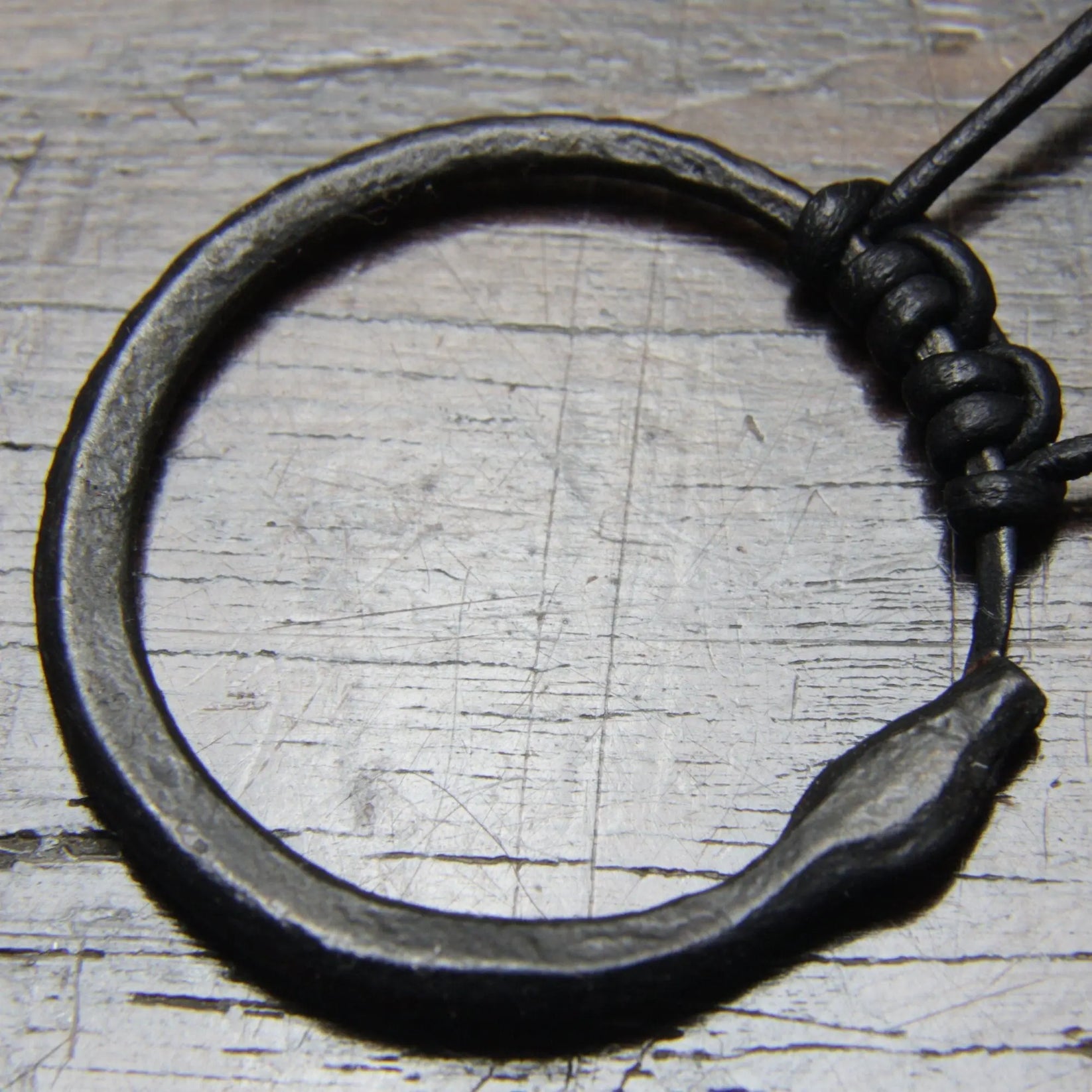 Ouroboros Snake Pendant, an infinity symbol hand forged out of pure ir ...